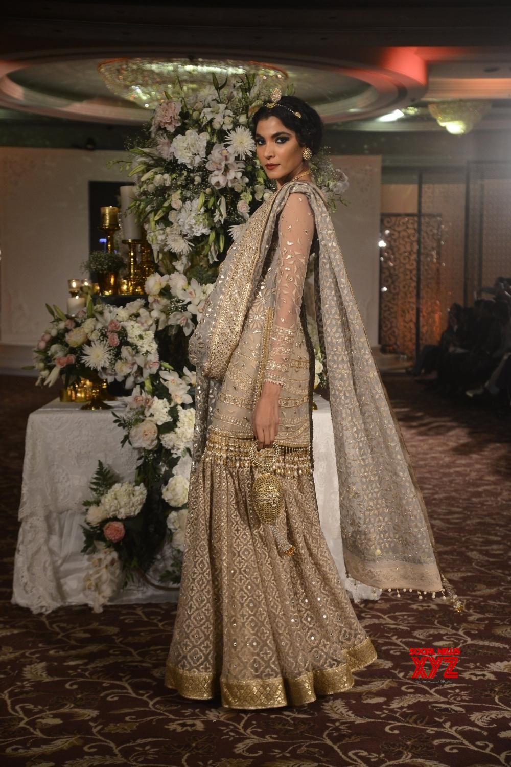 Mumbai: Models showcases Tarun Tahiliani's creations at wedding studio ...