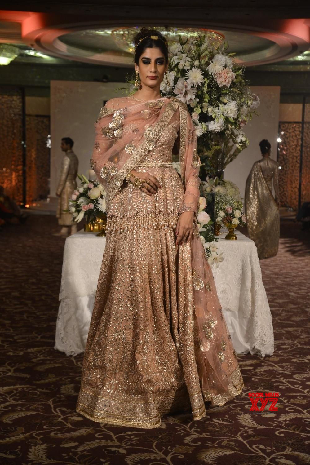 Mumbai: Models showcases Tarun Tahiliani's creations at wedding studio ...