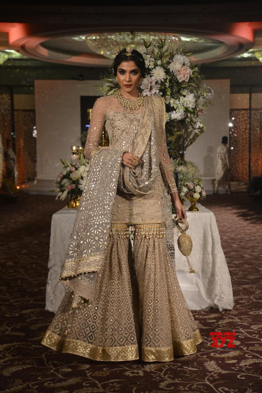 Mumbai: Models showcases Tarun Tahiliani's creations at wedding studio ...