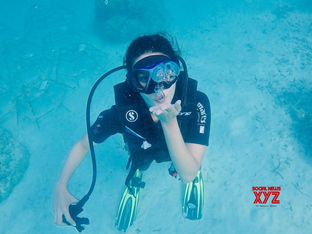 Actress Kriti Sanon Scuba Diving Stills - Social News XYZ