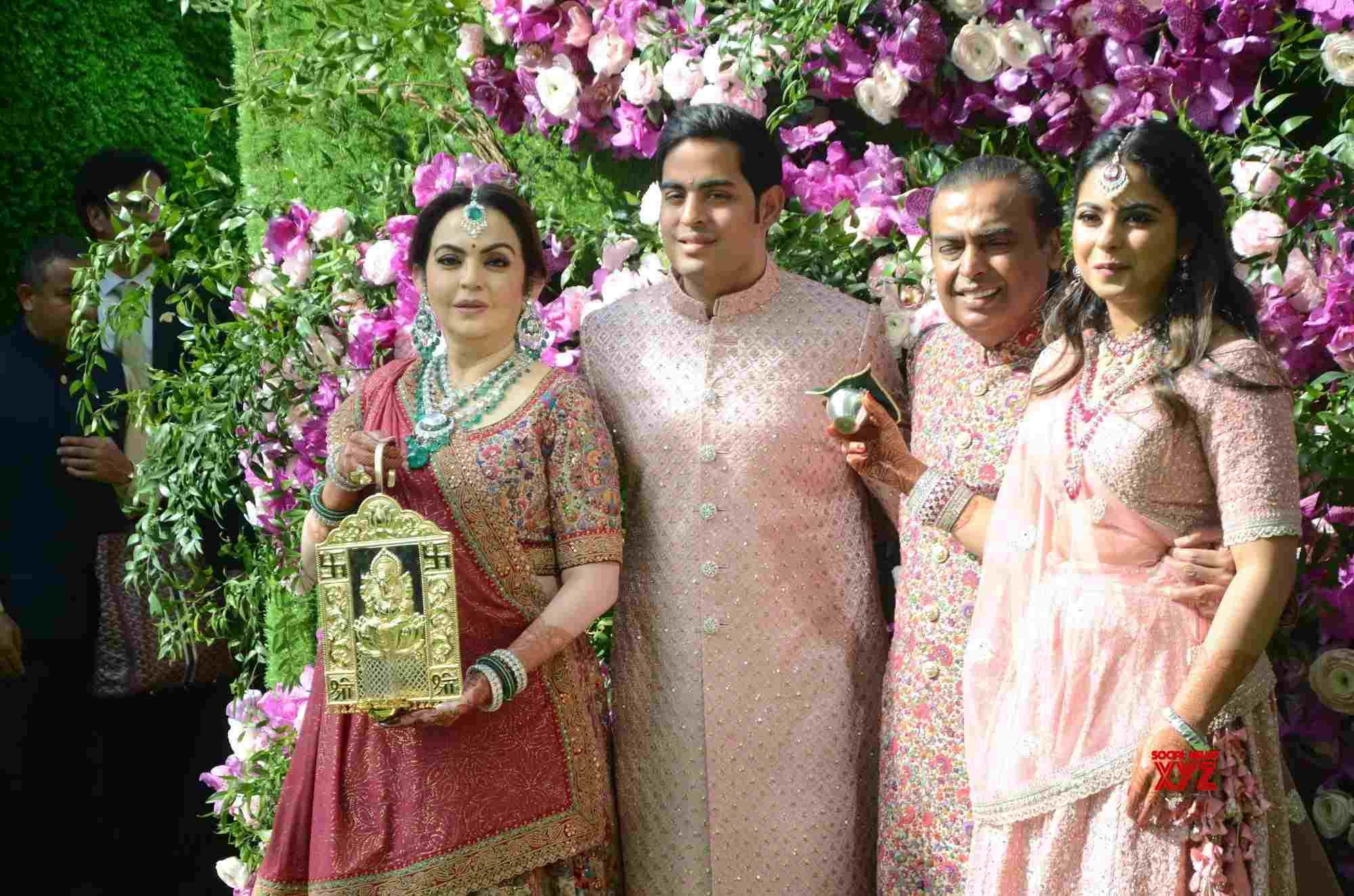 Mumbai: Mukesh Ambani, Nita, Esha and Akash at Akash, Shloka wedding ...
