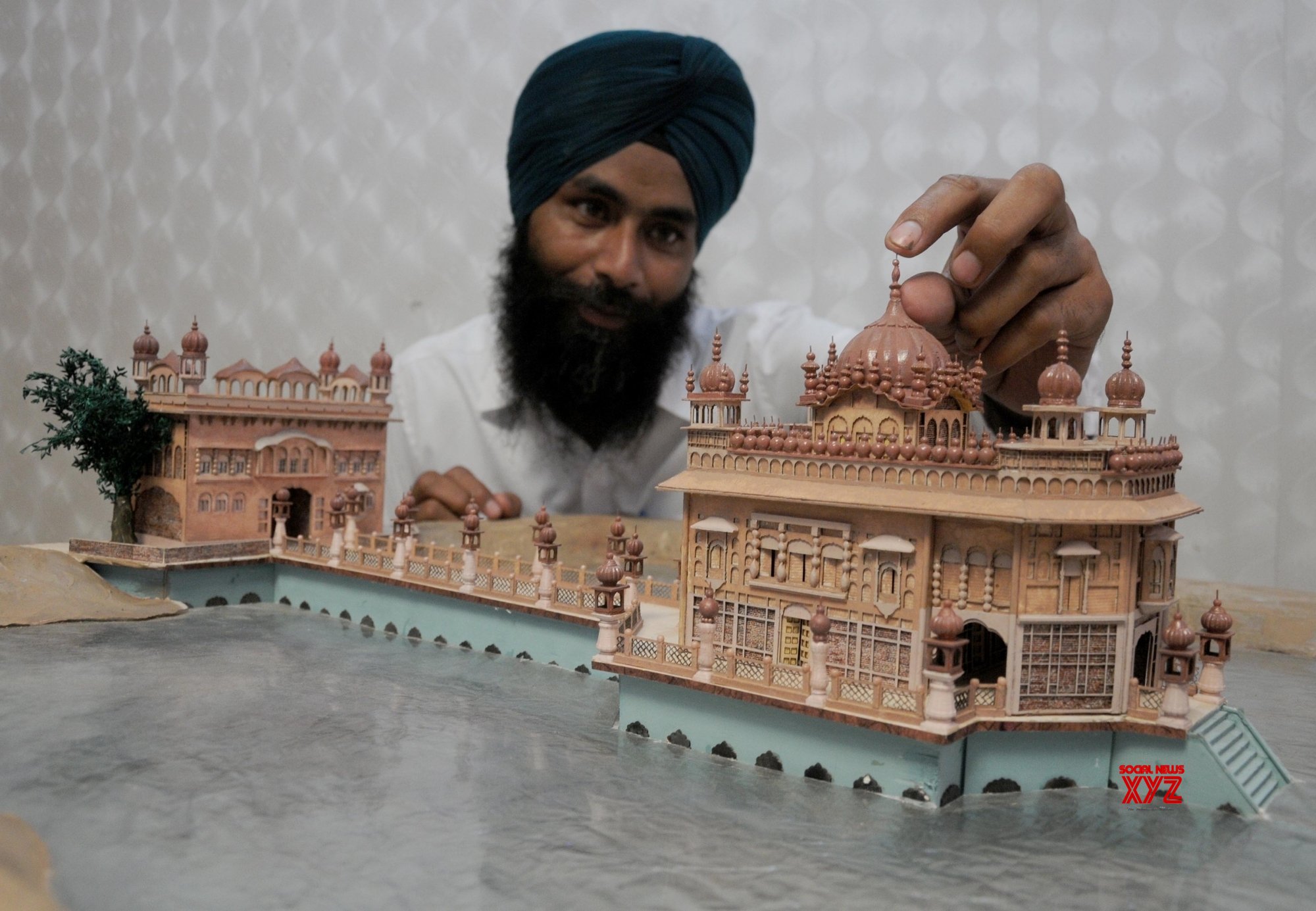Amritsar: Paper artist creates replica of Golden temple in its initial ...