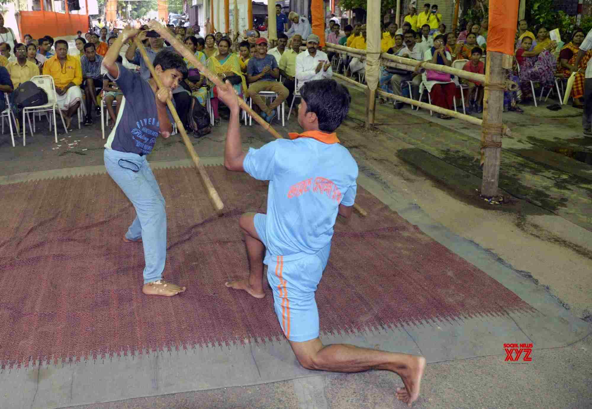 Kolkata: People participate in 'Lathi Khela' #Gallery - Social News XYZ
