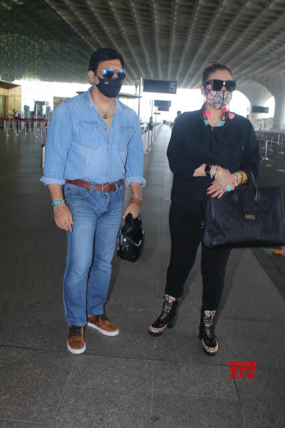 Govinda His Wife Spotted At Airport Departure - Gallery - Social News XYZ