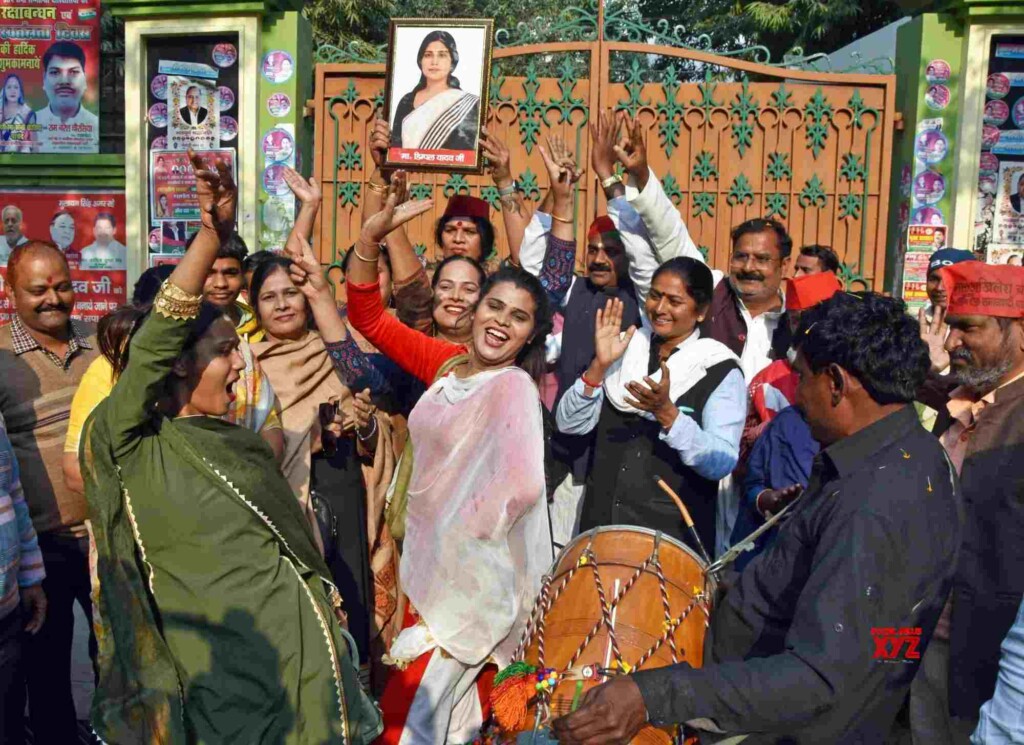 Lucknow: Samajwadi Party workers celebrate the party's victory in UP by ...