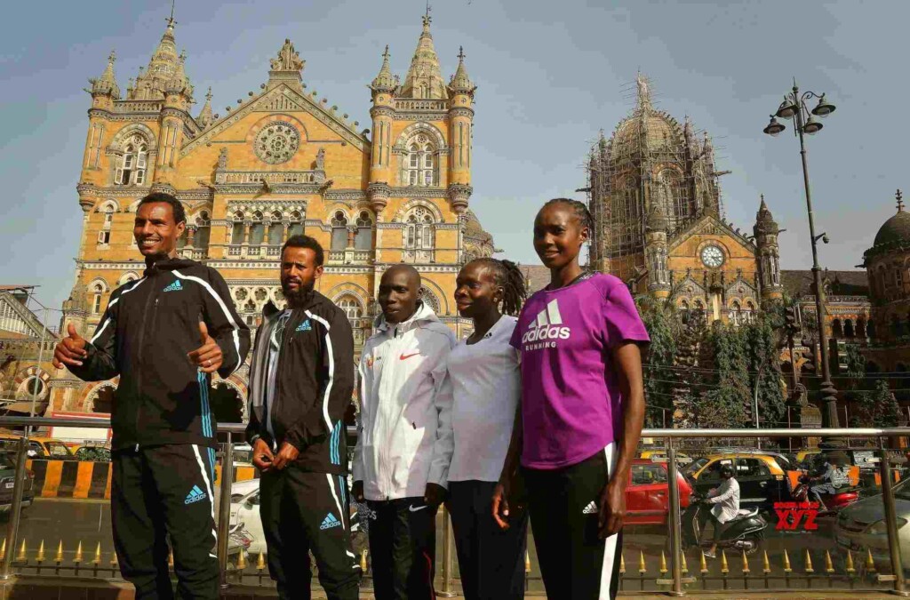 : Mumbai: International athletes and sprinters pose for a photograph in ...
