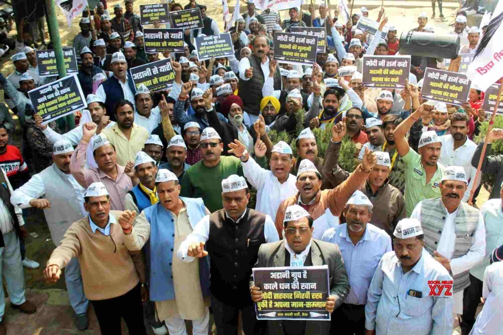 Meerut: AAP workers stage a protest against the Modi government over ...