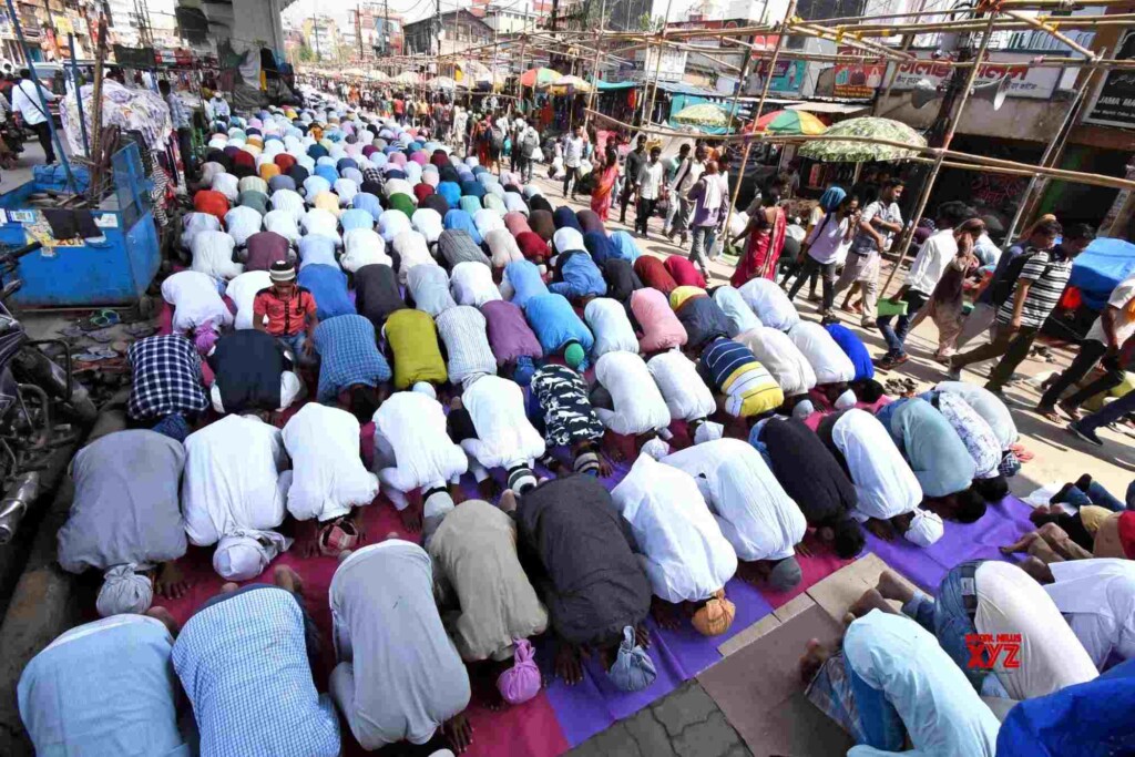 Patna : Muslim devotees offer prayers on a road during the first day of ...