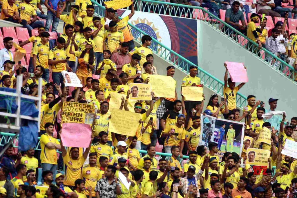 Lucknow : - CSK fans cheer for the team at Ekana Cricket Stadium # ...
