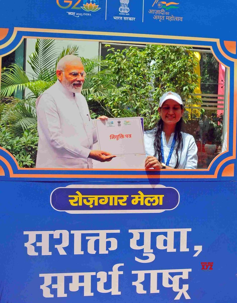 New Delhi: Newly inducted recruits pose for photos with a cutout of PM ...