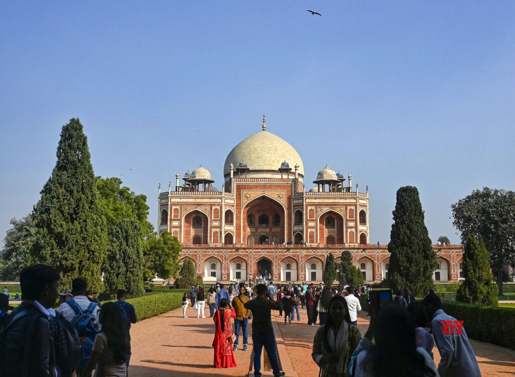 New Delhi: Visitors admire the historical beauty of Humayun's Tomb # ...