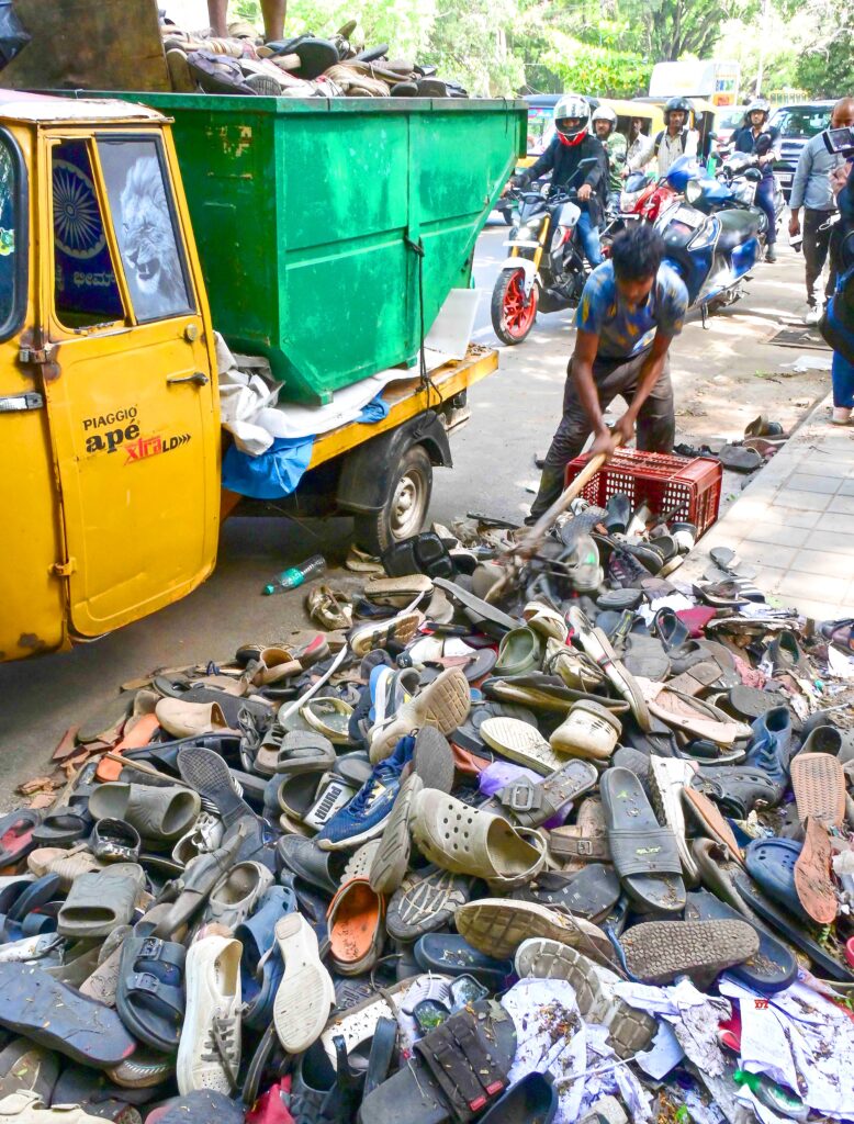 BBMP Workers Clear Footwear After Chinnaswamy Stadium Stampede #Gallery ...